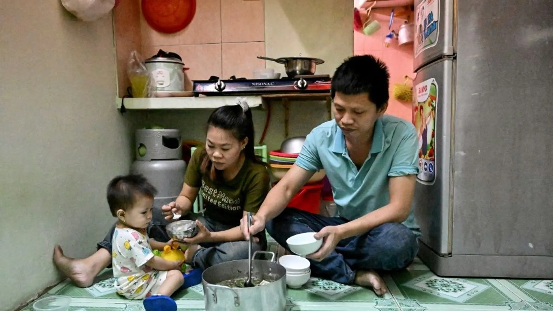 Au Vietnam, des ouvriers quittent les villes impayables pour retourner ...